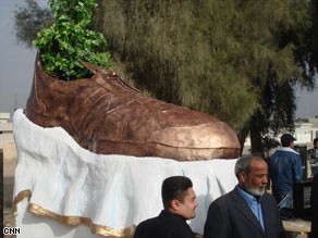 Iraqis construct shoe sculpture to honor Bush shoe-throwing incident ...