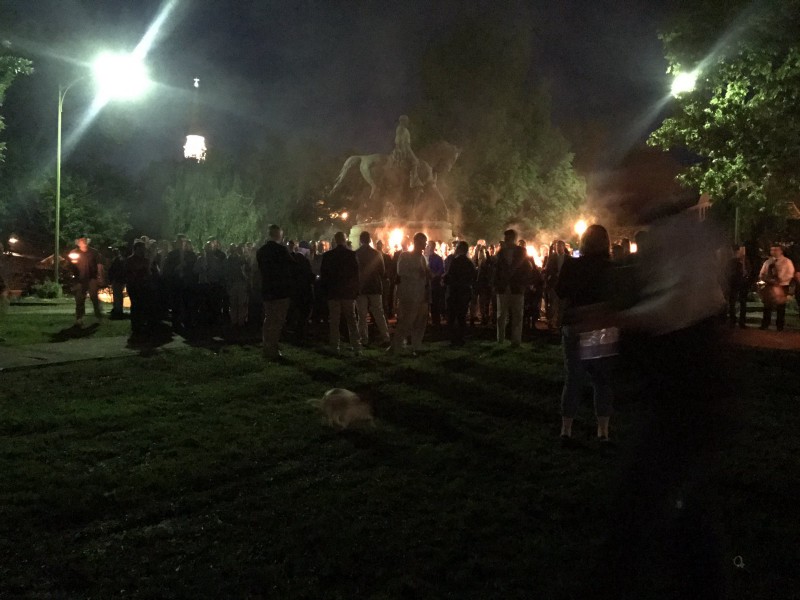 Torch-wielding mob stages rally to protest the removal of racist ...