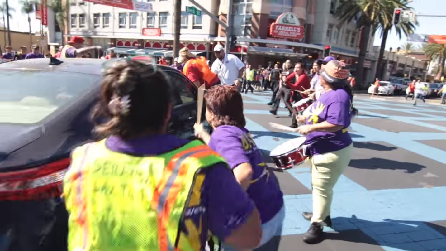 California driver rams immigrant rights protesters, cops seem ready to ...